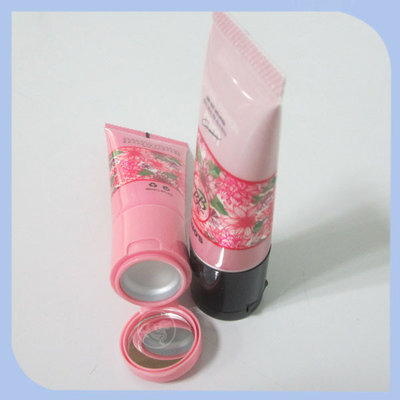 plastic cosmetic tube with mirror flip top cap
