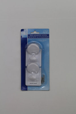 Ganci di plastica autoadesivi bianchi della parete, ganci decorativi della parete per i cappotti