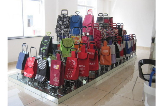 Customized small 600D PVC folding trolley wheeled shopping bags yellow