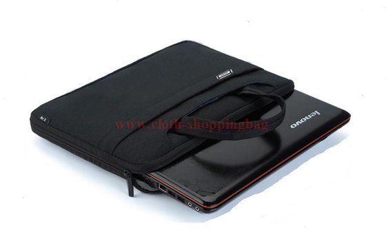 Green small nylon laptop computer bag with full - size exterior magazine pocket