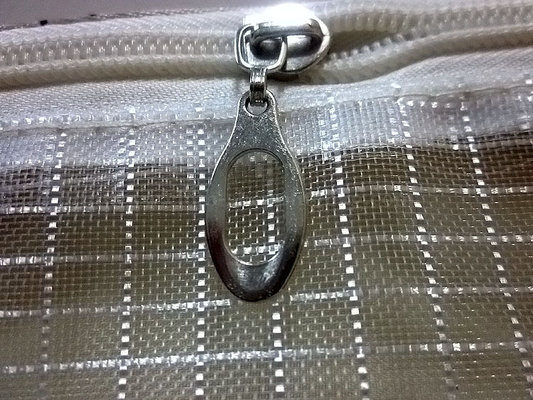 Delicate travel cosmetic handbag with a small mirror inside