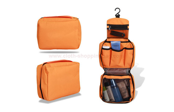 A two - way zipped main compartment travel storage folding  bag with handle