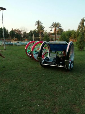 360 degree rotating black le bar car Rocking Bus game machine swing happy car amusement ride for sale