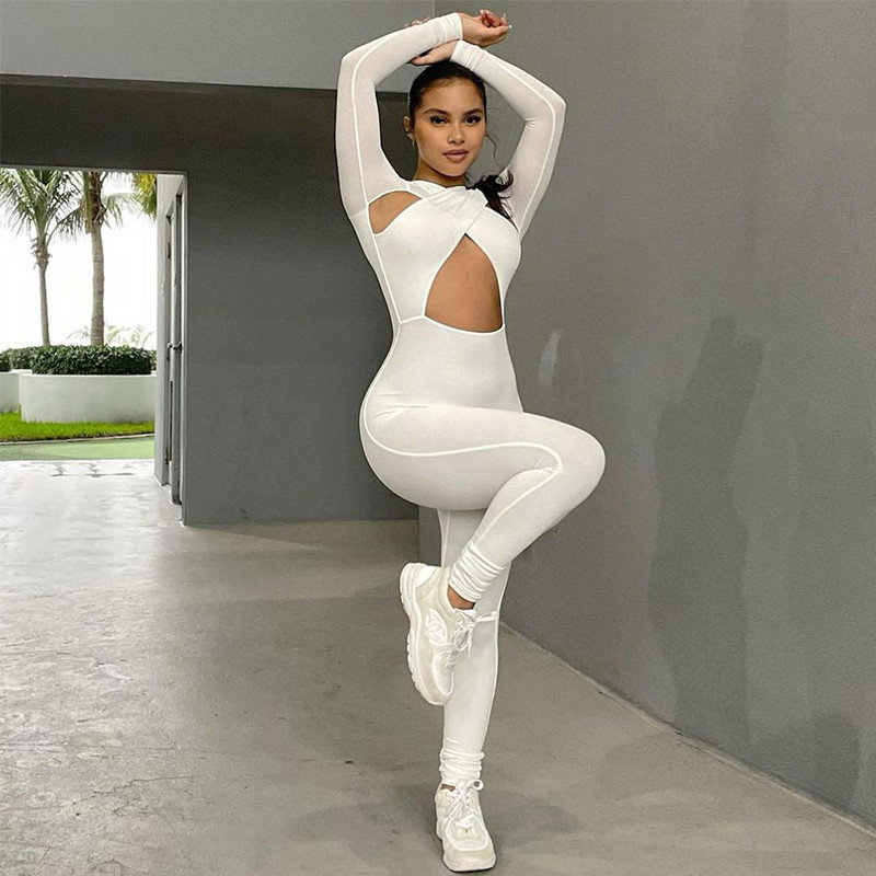 hot sale women long sleeve jumpsuit 2021 new design solid color hollow out bodycon cross bandage sportswear in stock