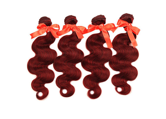 El cabello humano 4 de la onda del cuerpo de 100 Peruvian lía color rojo de las extensiones #99J