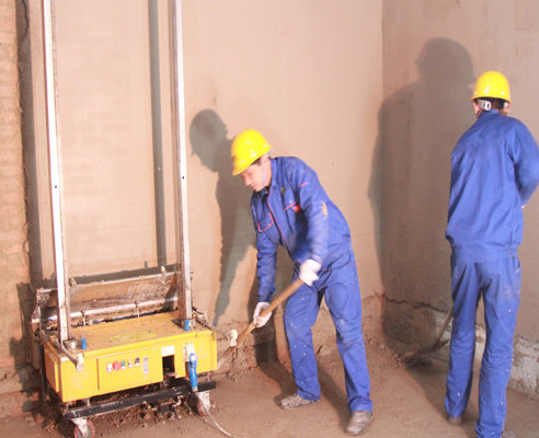 The automatic wall plastering machine made in China/rendering machine for wall,wall spraying  machine,