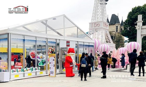 Transparent clear span event tent with glass walls and glass doors