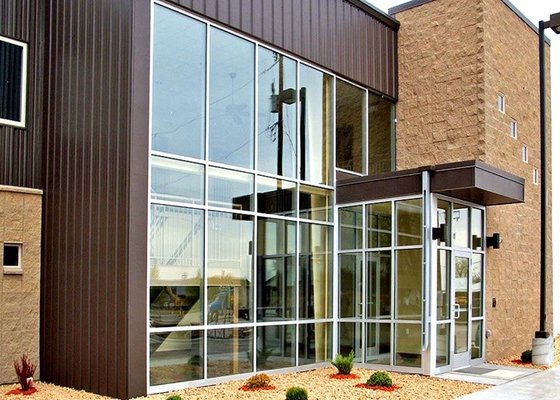 Single Slope Tapered Commercial Steel Frame Buildings With Large Glass Curtain Wall