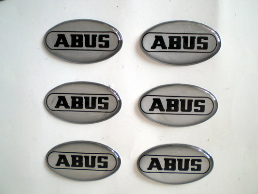 正常な銀製の背景が付いている黒い印刷物 ABUS のエレベーターのエポキシ樹脂ステッカー