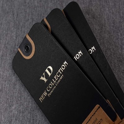 熱い押す衣類のこつは黒い Cardboad のペーパー Cottom ロープ アイレットに付けます