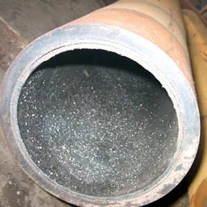 Abrasion resistant ceramic lined pipe