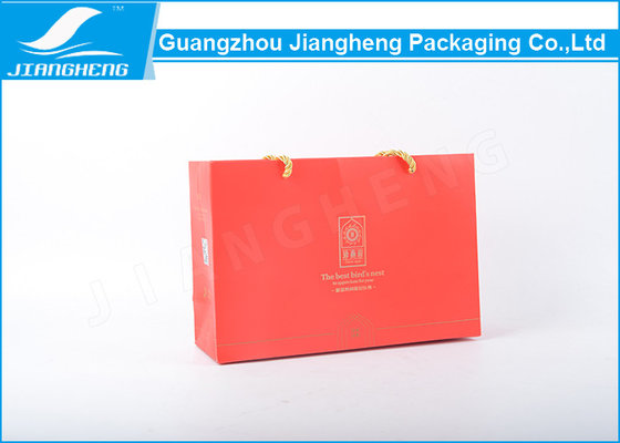 Bolsos de empaquetado de sellado calientes del papel del logotipo, bolsa de papel roja de las compras con la manija
