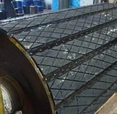 Belt conveyor drive pulley weld on rubber lagging for cement plant